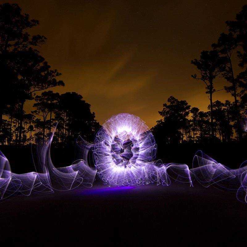 Purple Collapsible Light Sword. Draped effects and flame